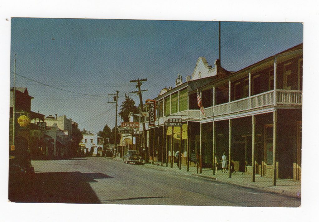 Chrome postcard. Jamestown California street scene. Signs. Setting for ...